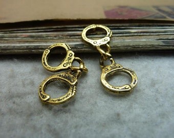 Gold handcuffs | Etsy