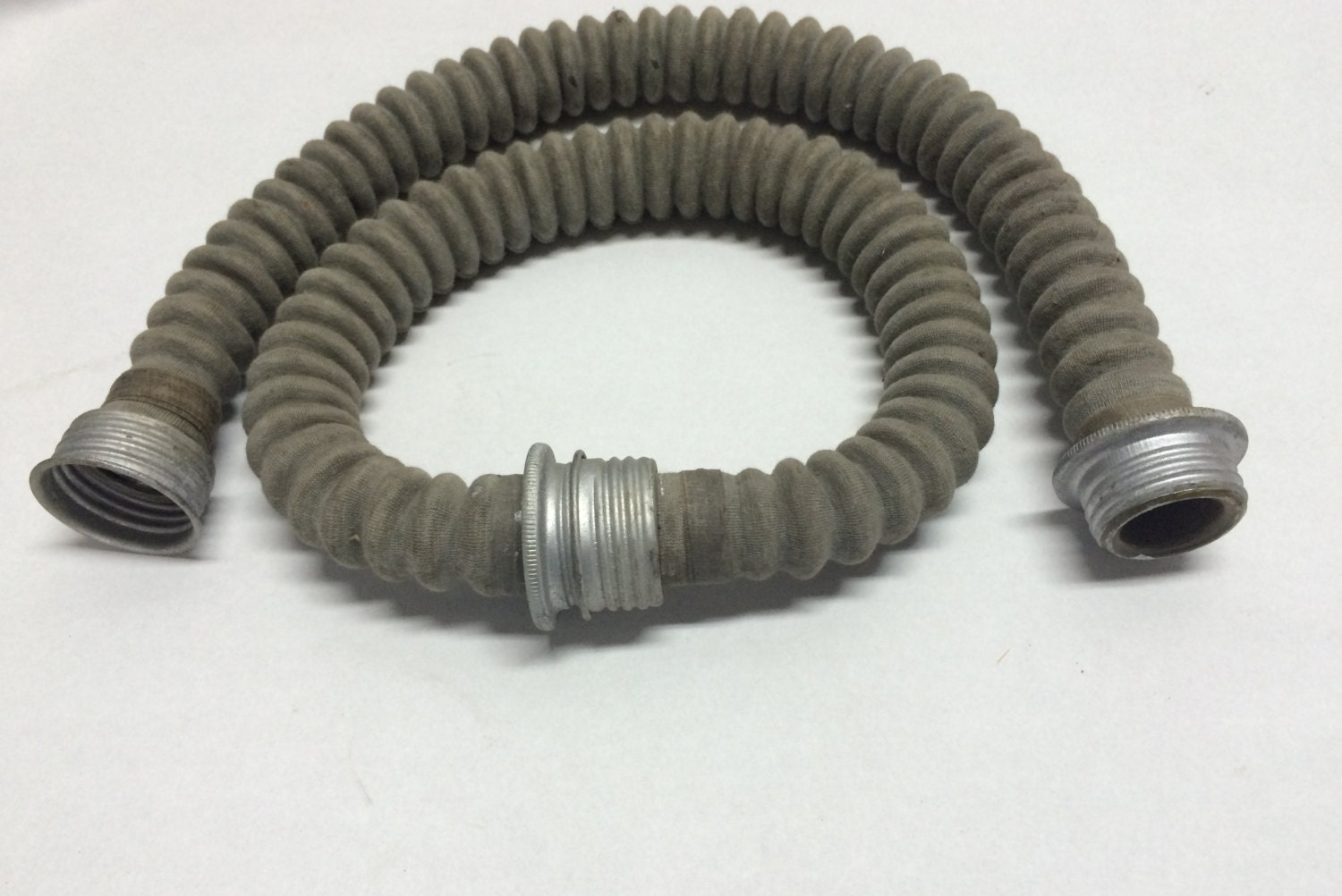 Soviet russian gas mask hose. Grey color canvas covered hose