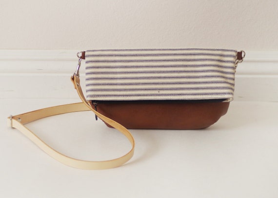 Small canvas fold over crossbody bag with zipper and vegetable