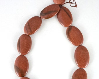 Rust colored stone | Etsy