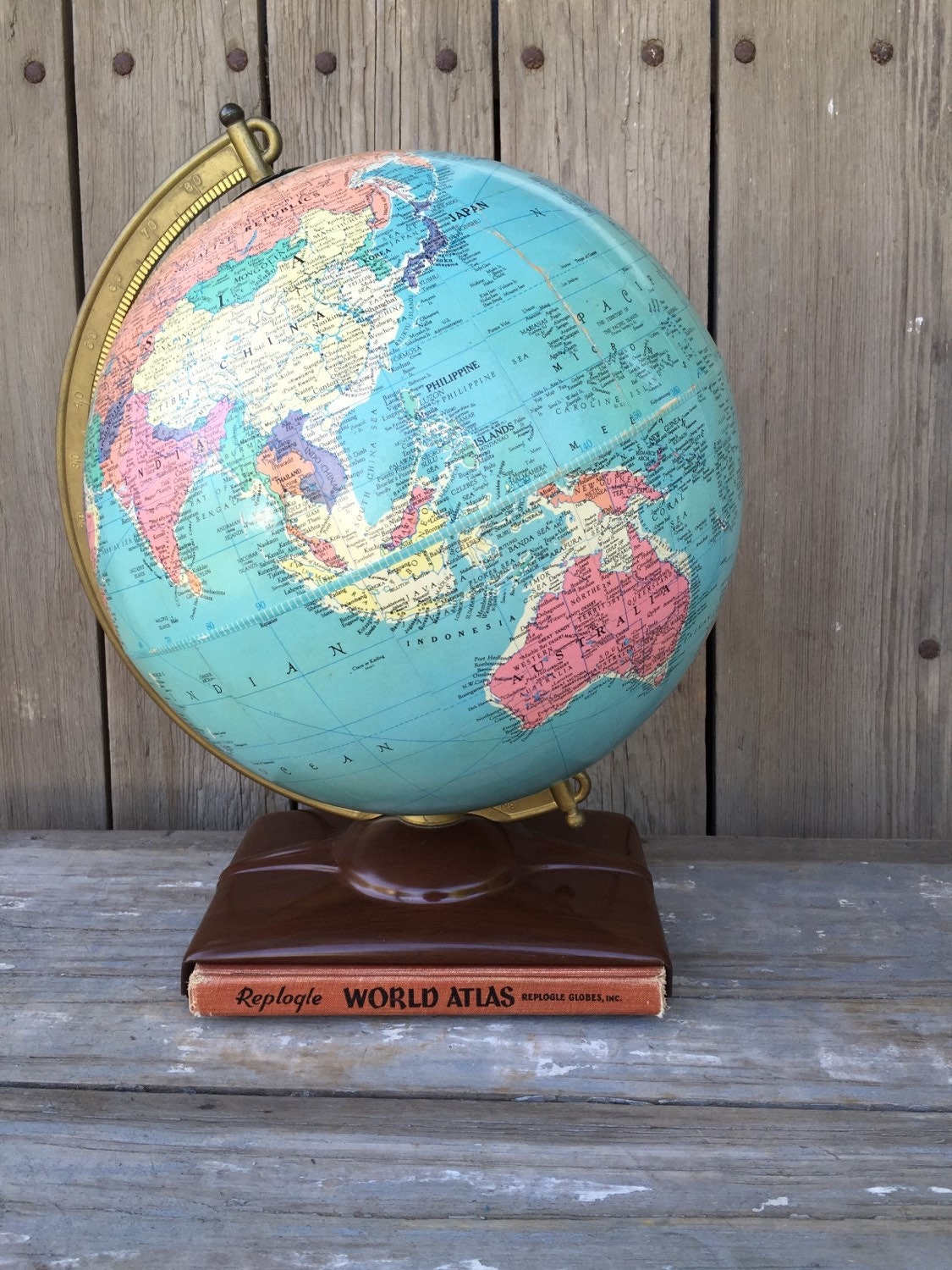 vintage replogle globe. 1950s globe with atlas book