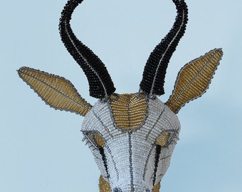 African lion wallpiece in beads and wire: The fearsome African