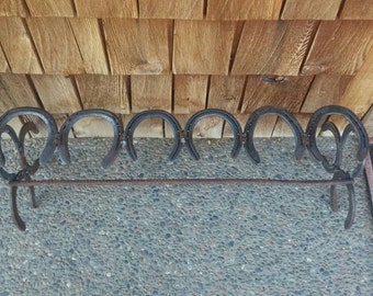 Horseshoe boot rack | Etsy