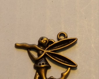 Items similar to Handmade 1950's pixie charm bracelet on Etsy