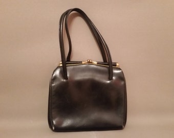 Items similar to Vintage 1950's leather handbag on Etsy