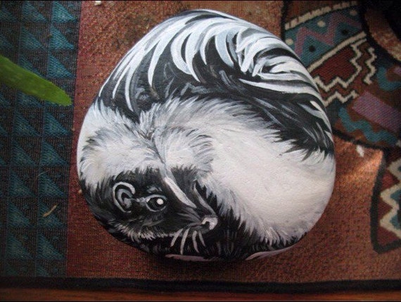 Painted skunk rock by KristinsArt4u on Etsy