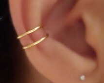 Unique faux conch earring related items | Etsy