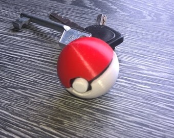 Items similar to Pokeball keychains on Etsy