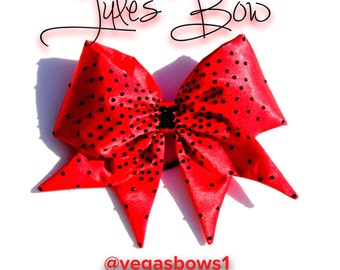 Justice bow by VegasBows1 on Etsy
