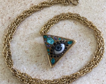 Illuminati necklace | Etsy