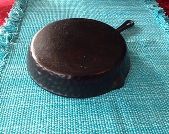 Hammered cast iron | Etsy