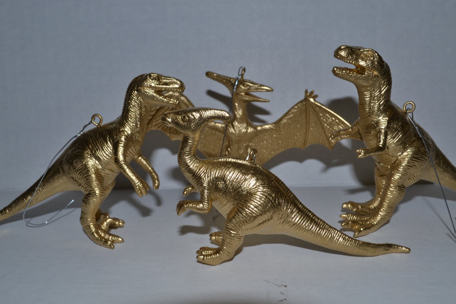 Dinosaur Ornaments gold raptor parasaurolophus t-rex