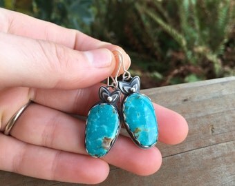 Items similar to Black and Turquoise Leaf, Feather Earrings on Etsy