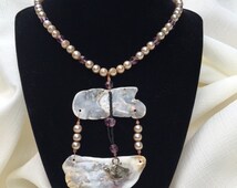 Unique oyster shell pendant related items | Etsy