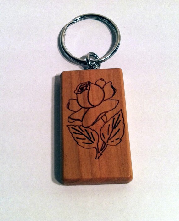 Laser Engraved Cherry Wood Key Chain Engraved with a Rose Bud Laser Engraved Cherry Wood Key Chain Engraved with a Rose Bud
