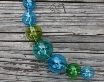 Glass ball with rope | Etsy