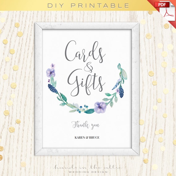 Floral wedding gifts signs cards and gifts reception table