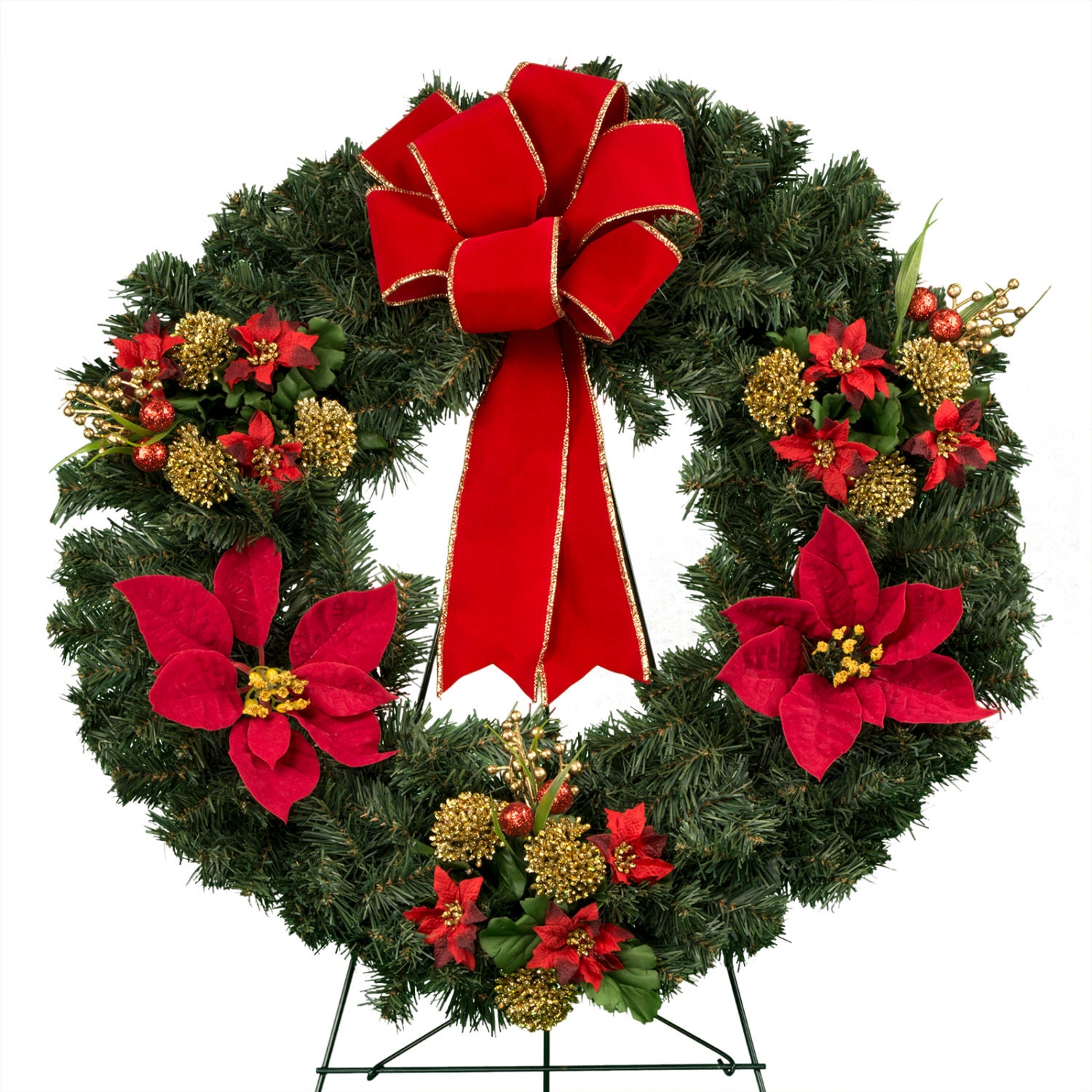Christmas Wreath With Poinsettia Decorations and Bow