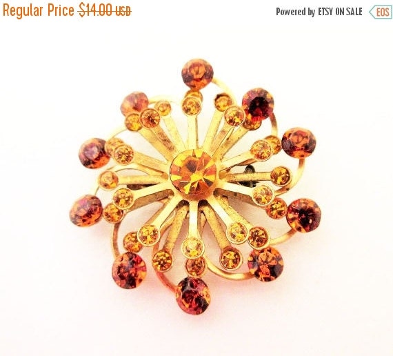 Atomic Brooch Amber Rhinestones In A Gold Tone Setting
