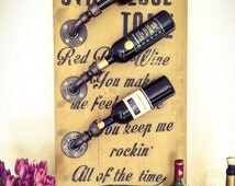 Popular items for industrial wine rack on Etsy