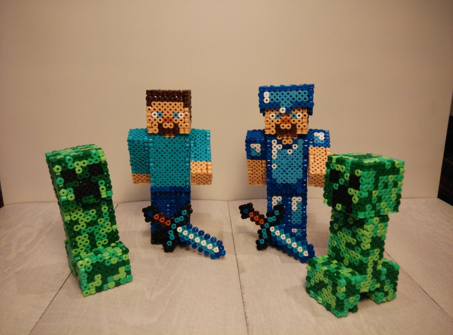 Hama beads-made Minecraft 3D puppets / by DragonsAndPrincesses