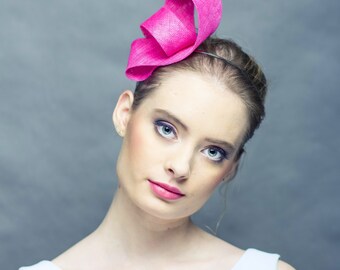 Modern fascinator gold fascinator serpentine shape