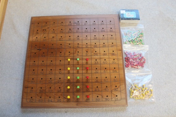 Five Straight board game with cards pegs