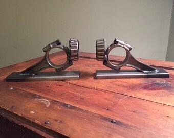 Hand crafted table lamp using repurposed engine/car parts.