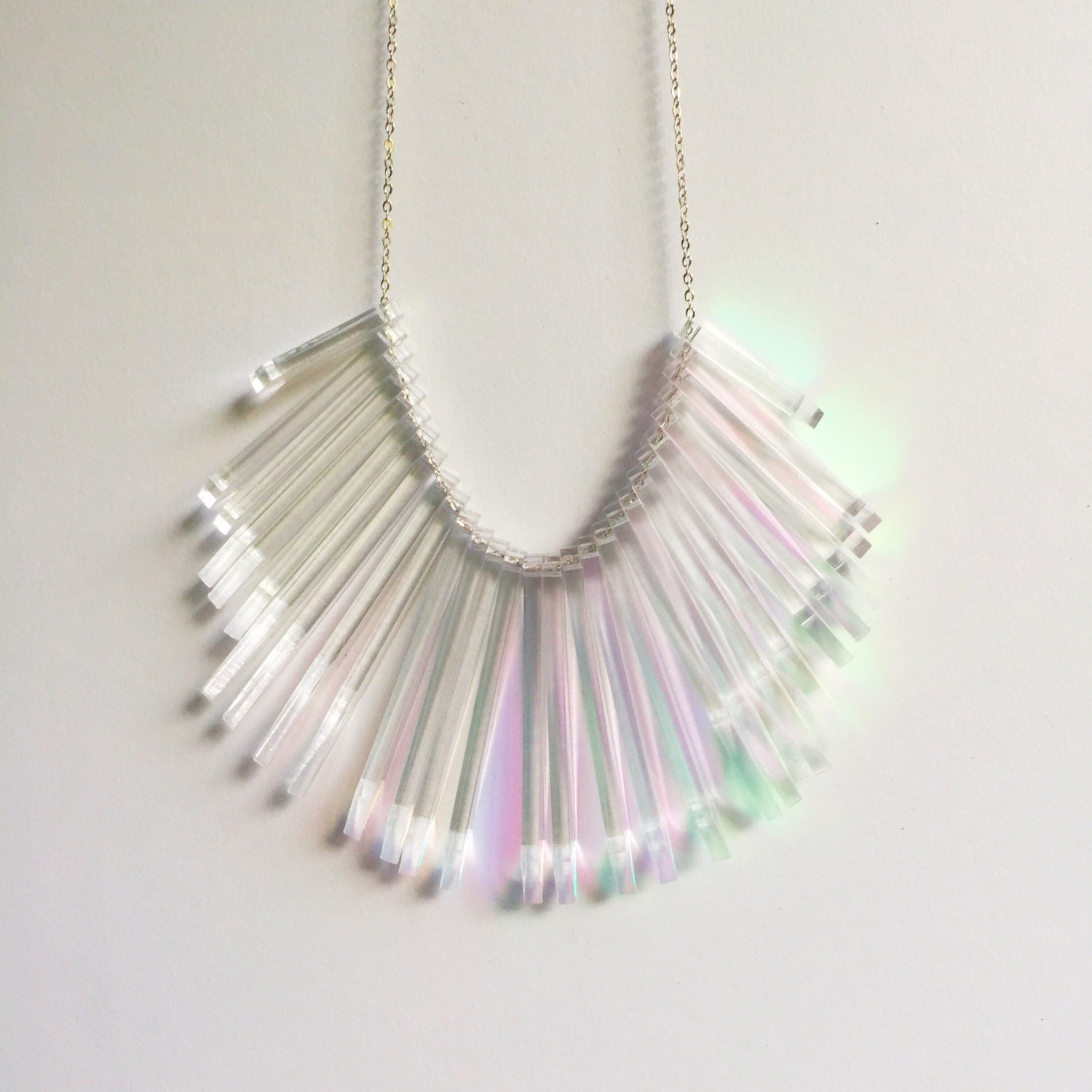 Large laser cut iridescent clear acrylic beaded necklace