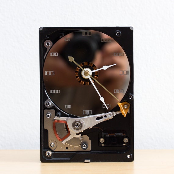 Desk clock made of a recycled Computer hard drive by ReComputing