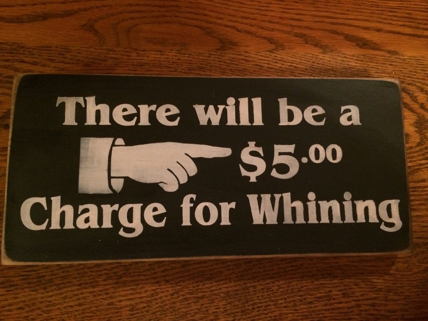 There will be a 5.00 charge for Whining sign 12x6