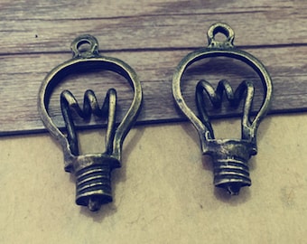 Light bulb necklace | Etsy