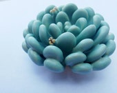 Handmade ceramic flowers and succulents by Owen by OwenCharlesMann