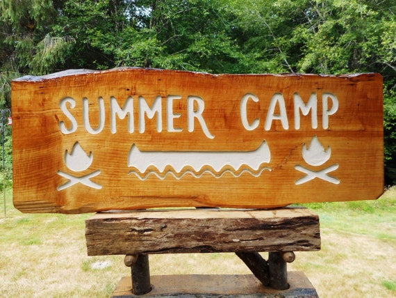 Camp sign SUMMER CAMP. Letters hand-carved routed and