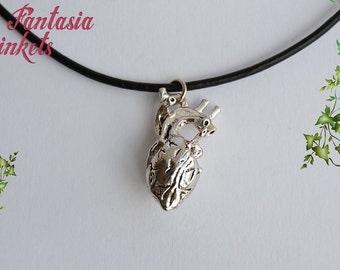 Human heart necklace | Etsy