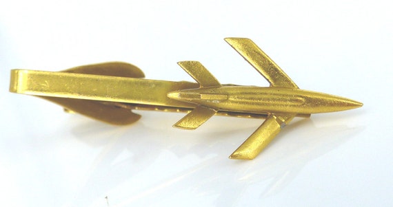 Vintage brass jet plane tie bar / tie by ModernRenaissanceMan
