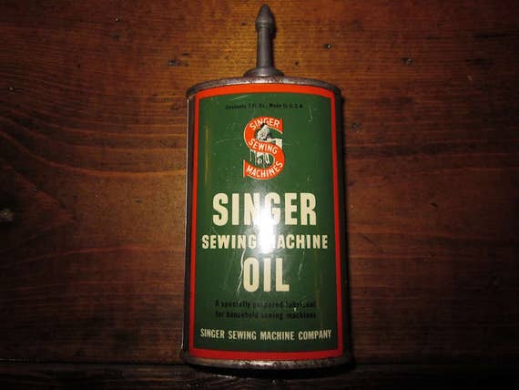 Vintage Singer Sewing Machine Oil Tin With lead top 3 oz.