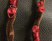 Custom hand-made loc jewelry of any shape and by LocEssentials