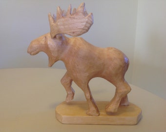 Carved wood animal | Etsy