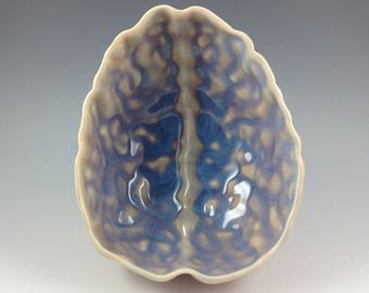 Unique biomorphic creations in mud by Bridget Fox by Mudventions