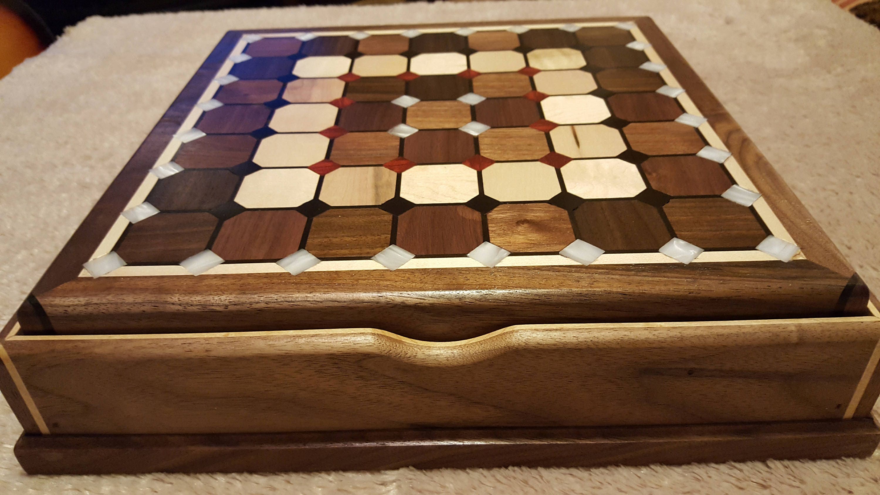 Tak board with box and game pieces