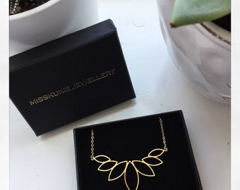 Laser cut necklace | Etsy