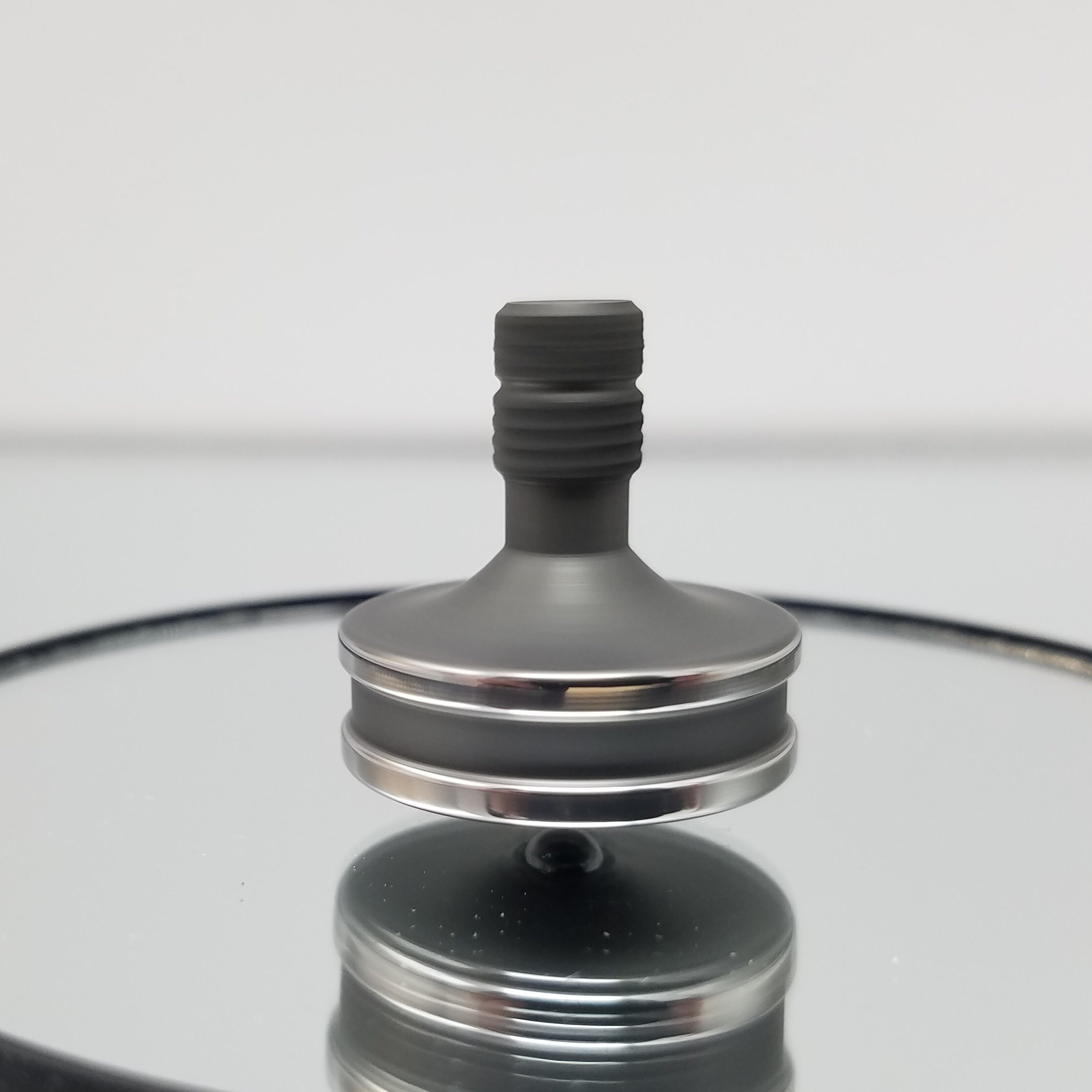 Precision Metal Spinning Tops Made in the USA by KemnerDesign