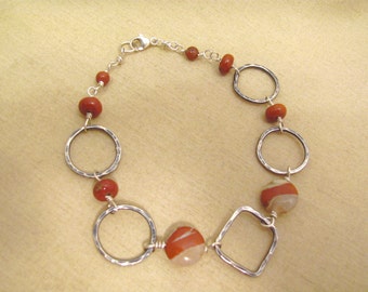 Hand forged sterling silver & copper by GretchenSmithJewelry