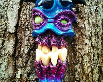 One of a kind hand sculpted wall art by WickedWallMasks on Etsy