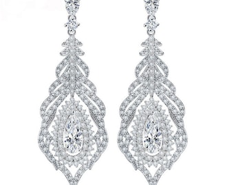 Feather earrings | Etsy