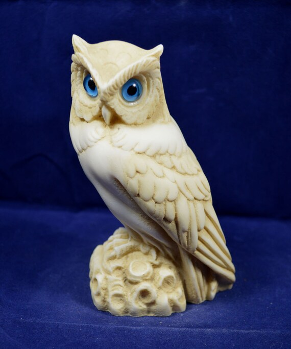 Owl sculpture statue Ancient Greek symbol of knowledge and