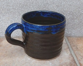Left handed coffee mug tea cup in stoneware hand by CaractacusPots