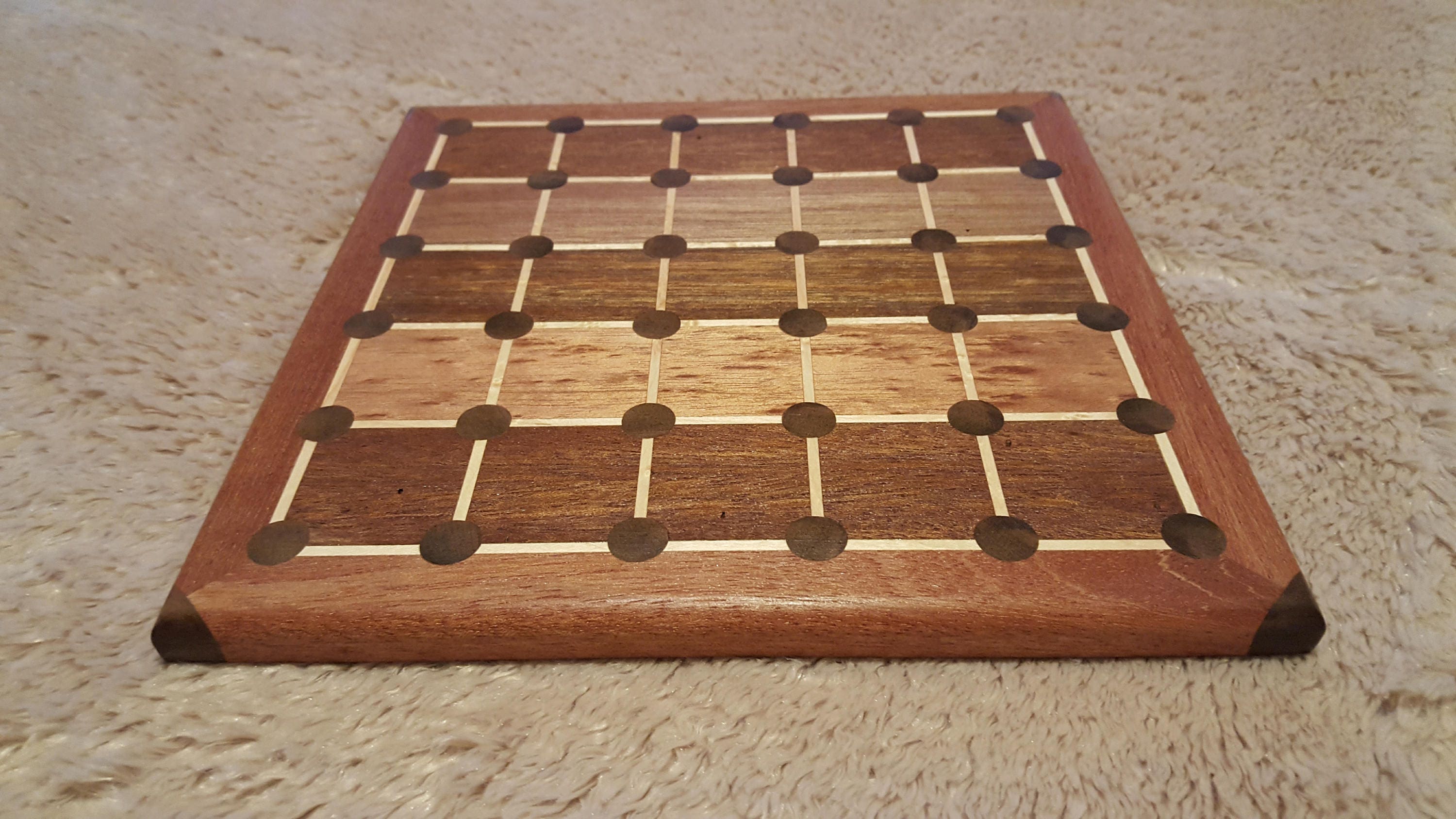 Tak board with game pieces