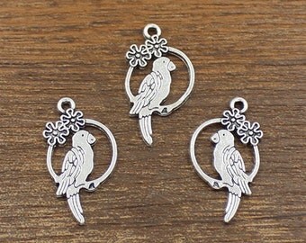 Parrot charm | Etsy